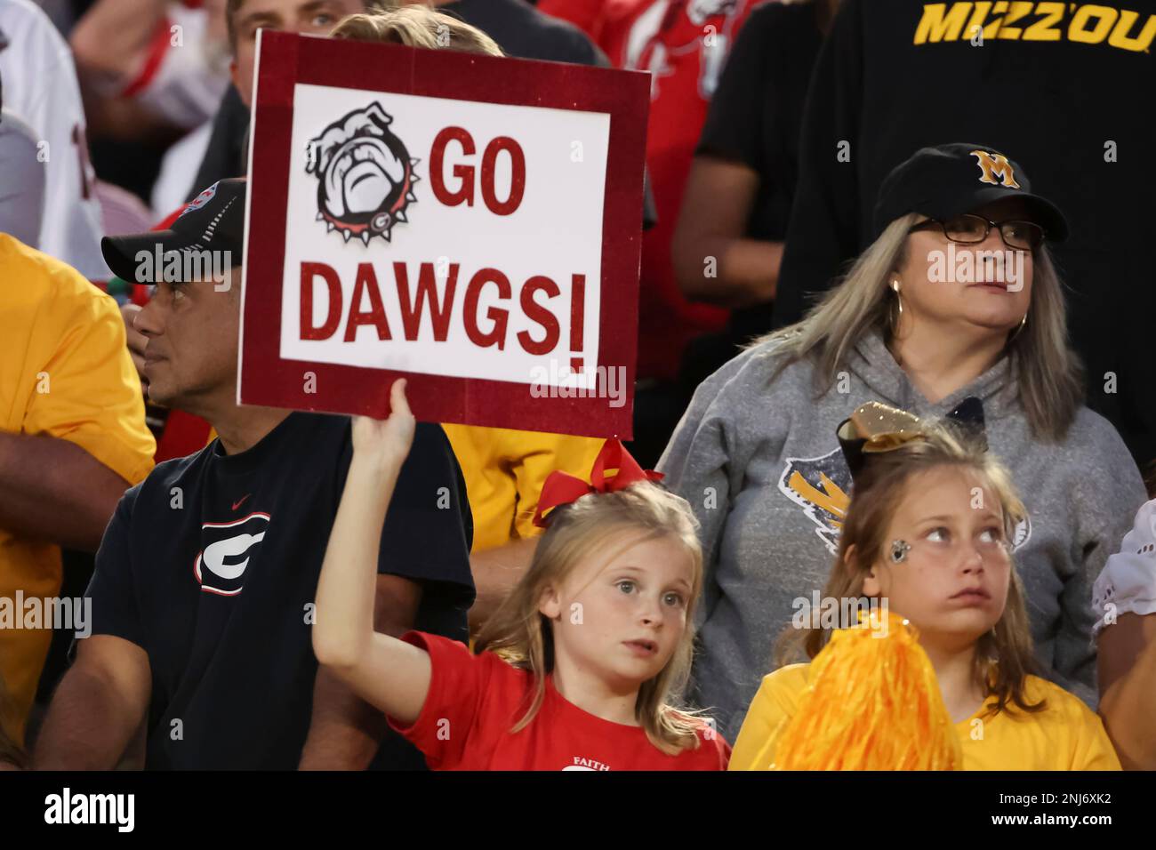 COLUMBIA, MO - OCTOBER 01: A young fan holds a "Go Dawgs" signed during ...