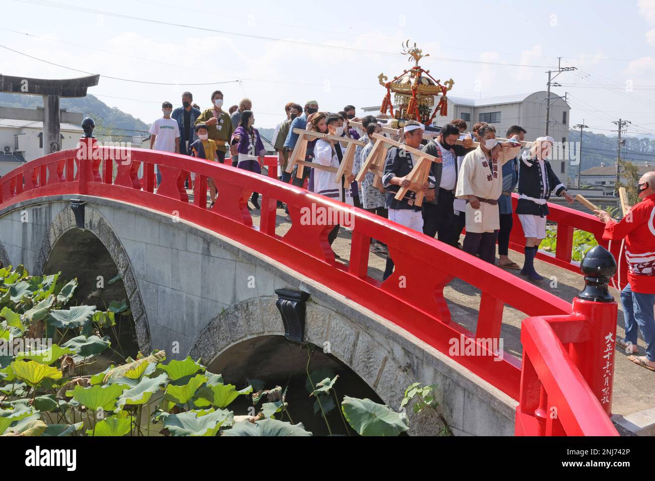 Priests and worshippers attend a ceremony of first crossing of Misagi ...