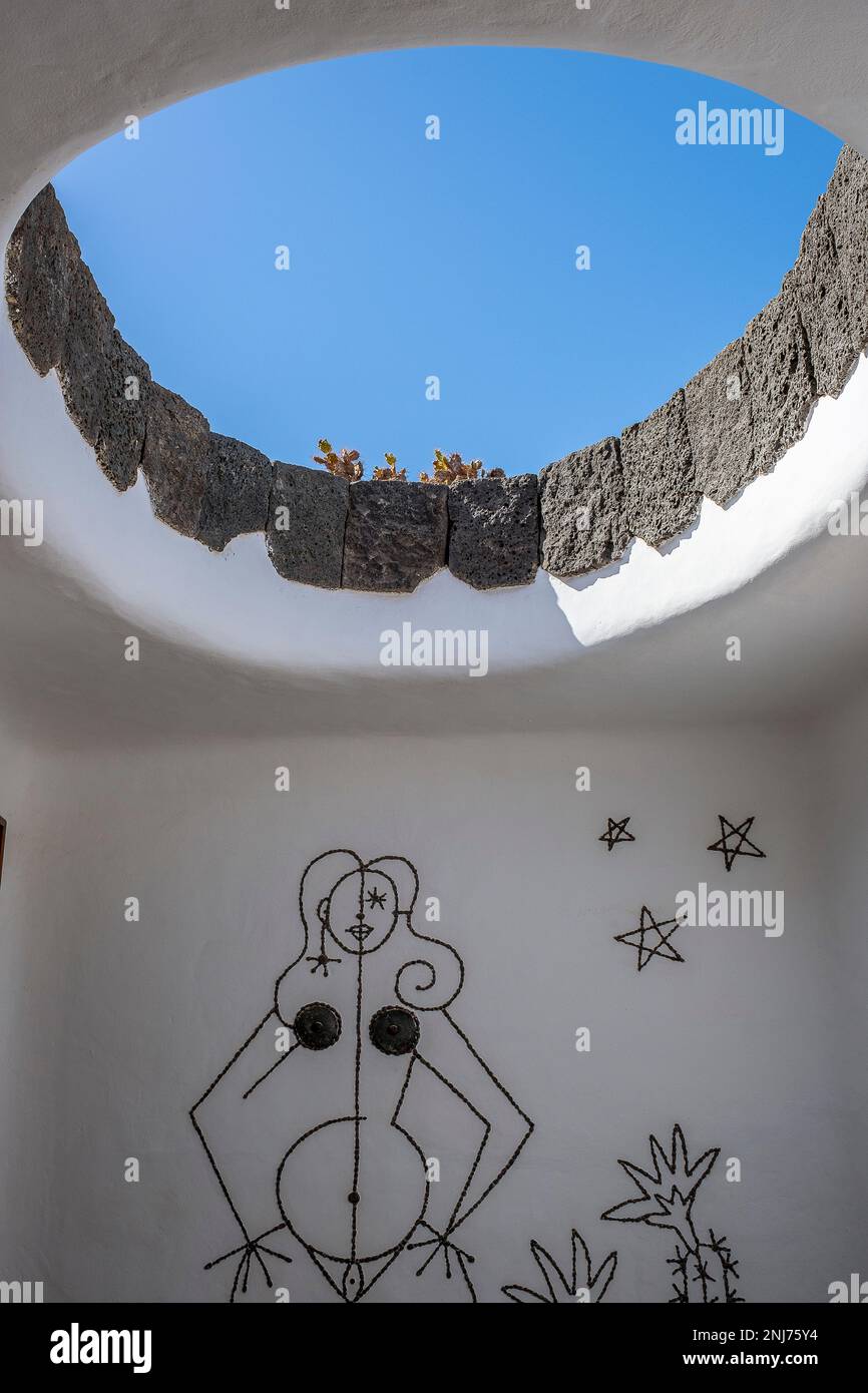 Woman toilette, in Cactus garden, creation of artist Cesar Manrique ...