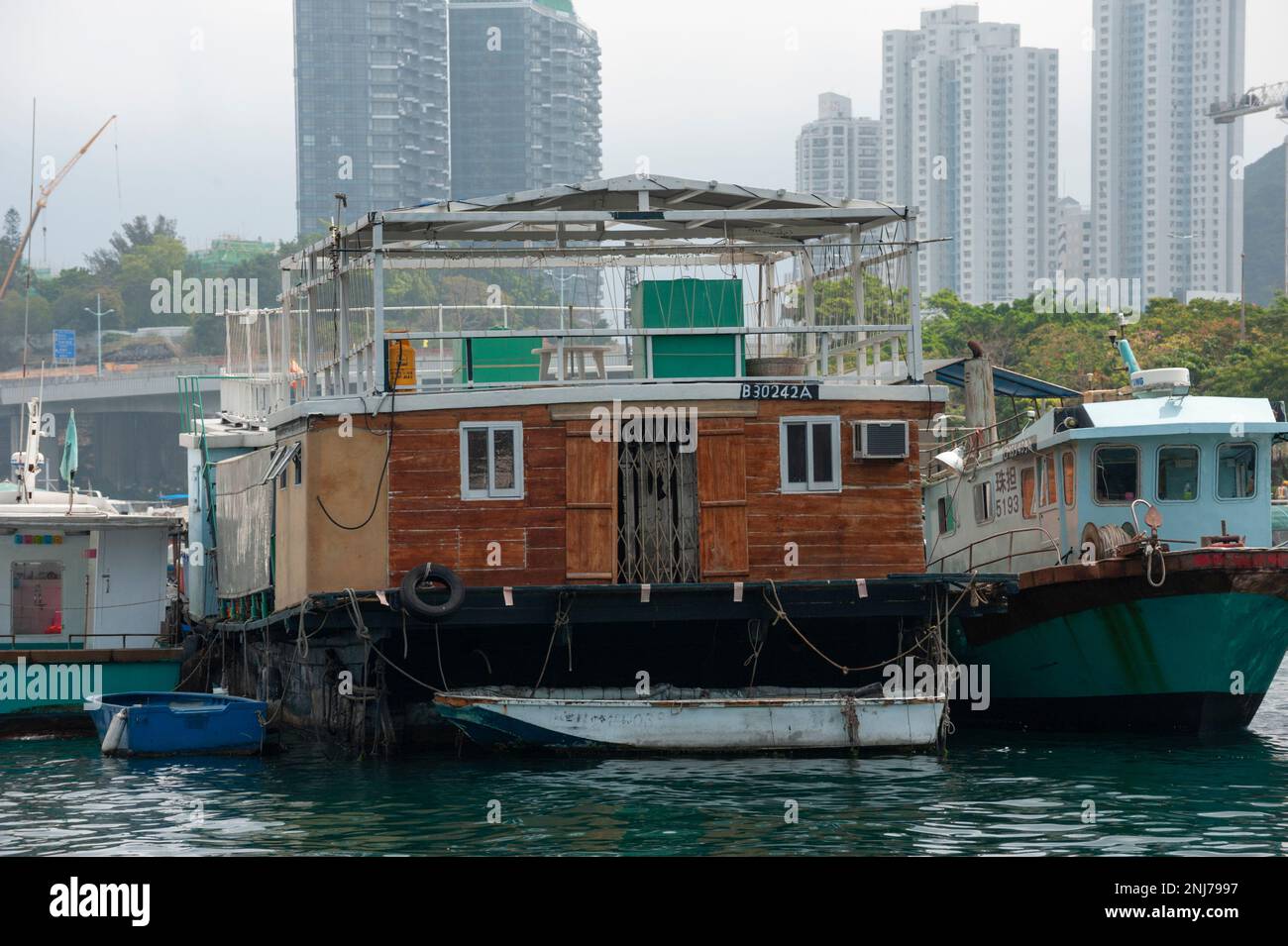 Hong Kong's Aberdeen Harbour - known for its floating villages - is ...