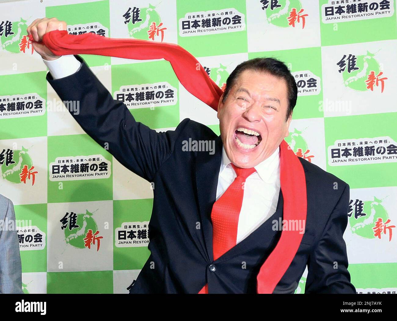 Antonio Inoki poses during a press conference in Tokyo on June 5, 2013 ...