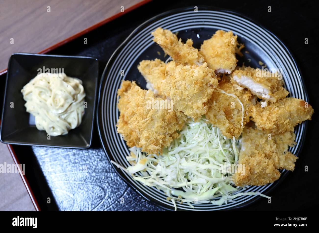 A dish of deep fried dolphinfish is offered at a restaurant, Kaede ...