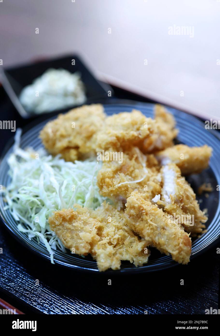 A dish of deep fried dolphinfish is offered at a restaurant, Kaede ...