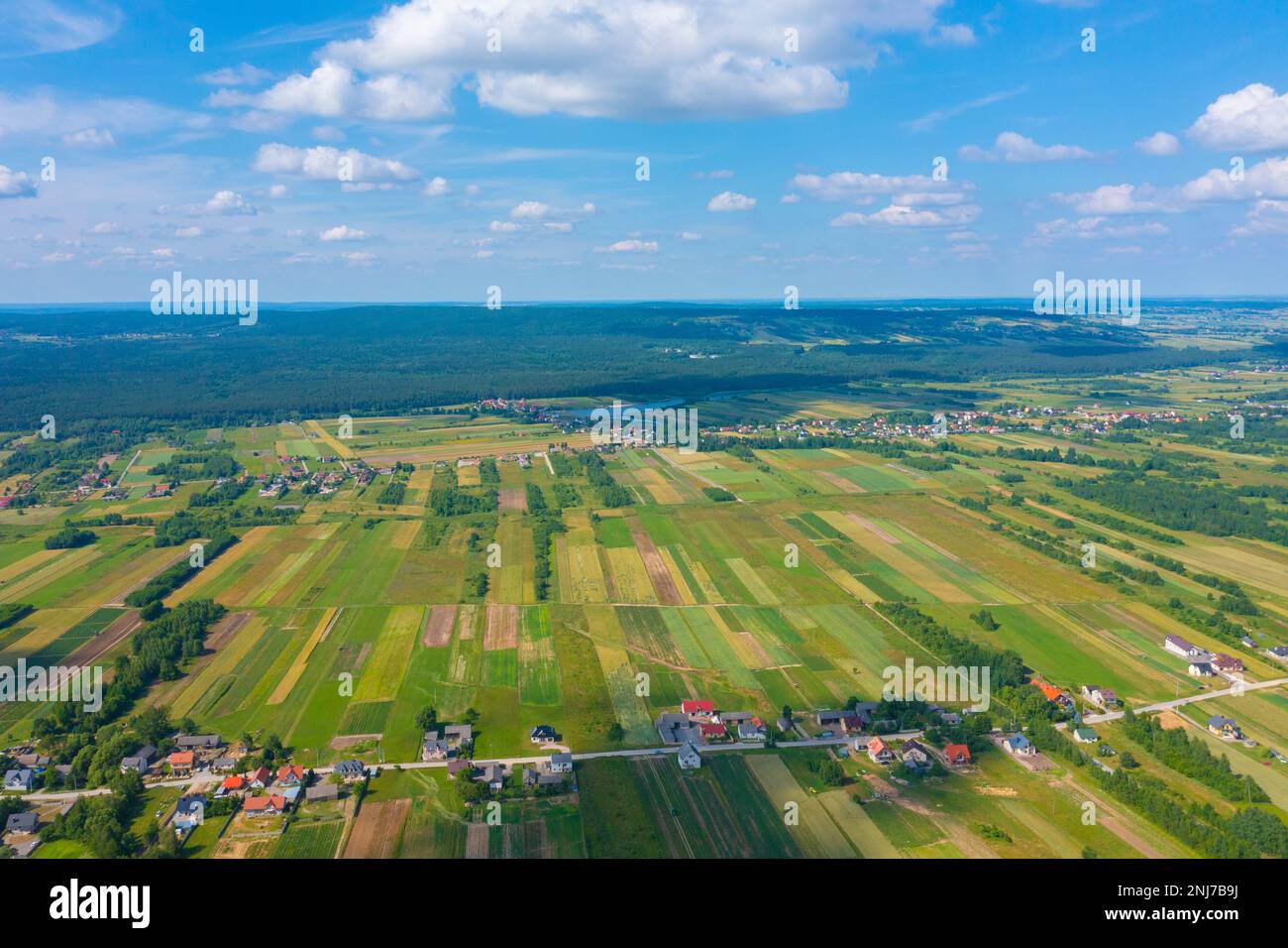 Beautiful countryside scene. Aerial view of rural road, agribusiness ...