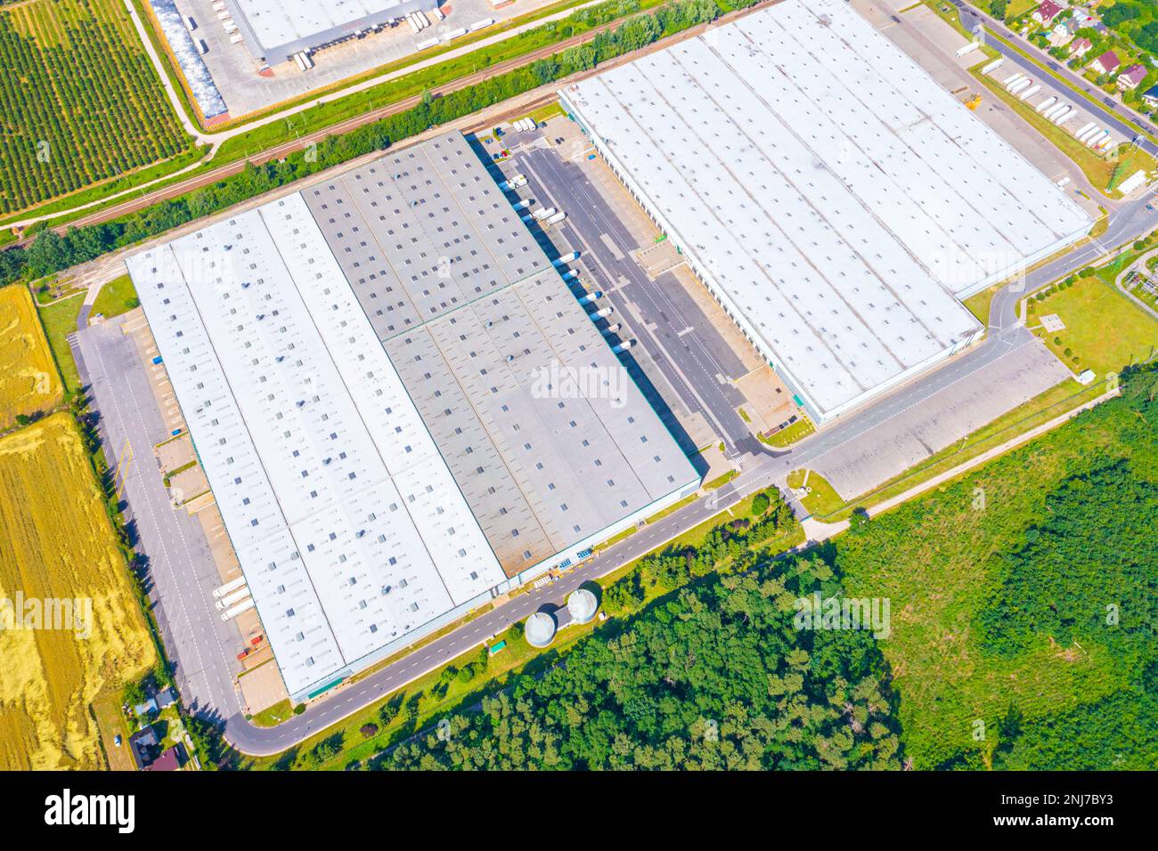 Aerial view of the logistics park with warehouse, loading hub and many ...