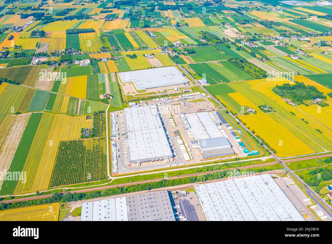 Aerial view of the logistics park with warehouse, loading hub and many ...