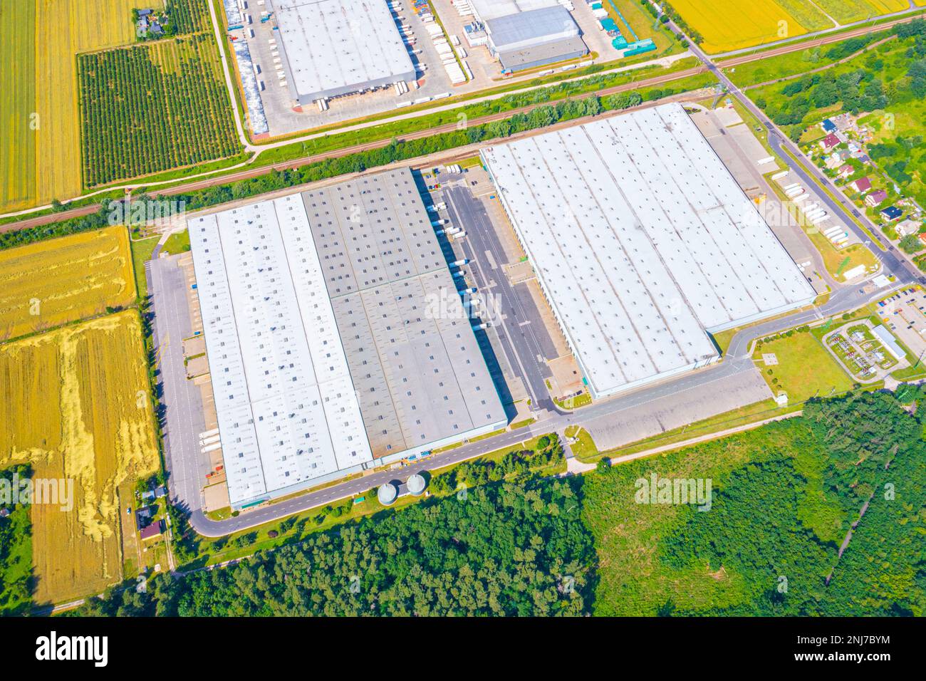 Aerial view of the logistics park with warehouse, loading hub and many ...