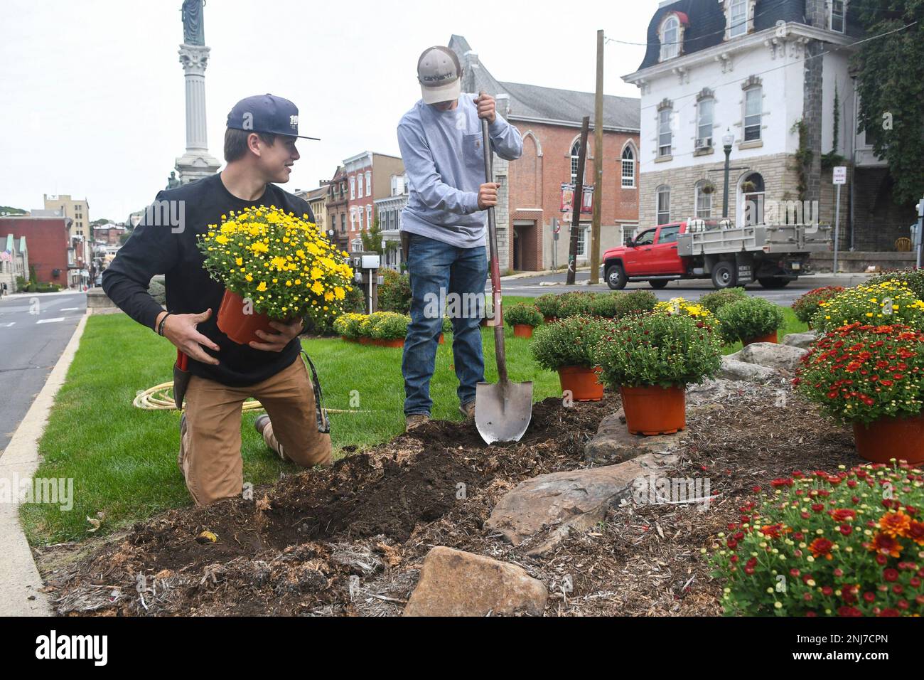 Long Run Landscaping employees Adam Burke, left, and Clayton Gerber ...