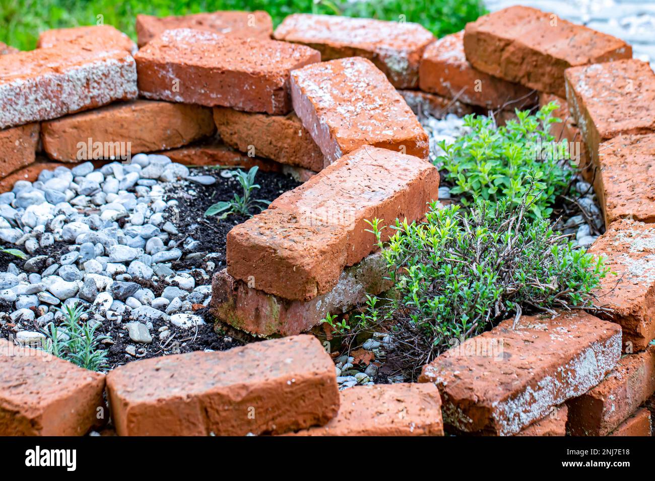 Brick circle for herbal garden Stock Photo - Alamy