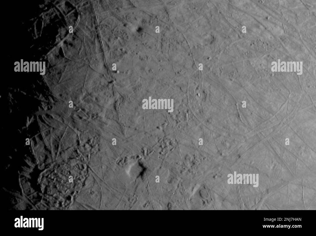 This image made available by NASA shows the complex, ice-covered ...