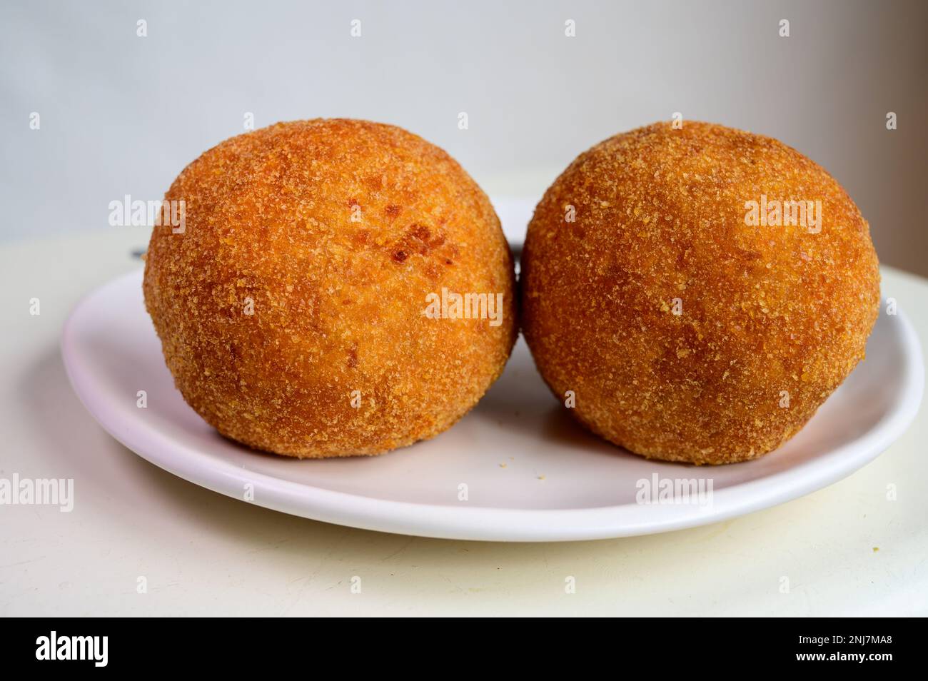 Traditional street food in UK, stuffed fried Scotch eggs with ...