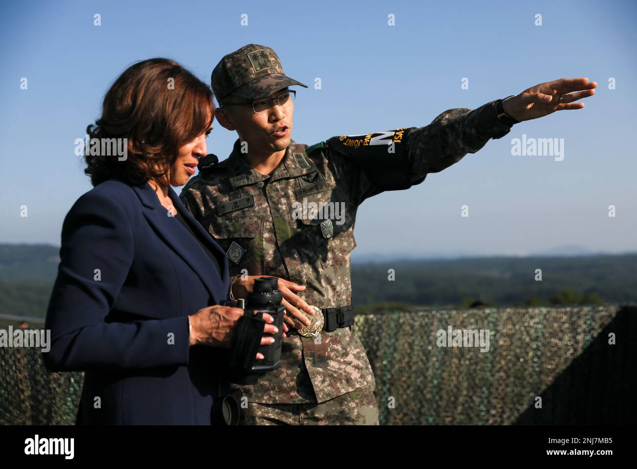 U.S. Vice President Kamala Harris stands at a military observation post ...