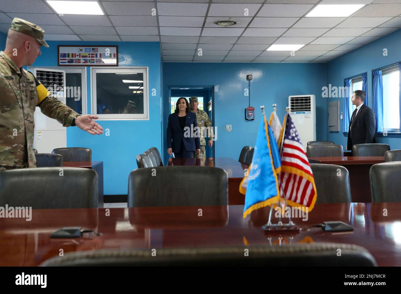 U.S. Vice President Kamala Harris, center, walks into a T2 conference ...