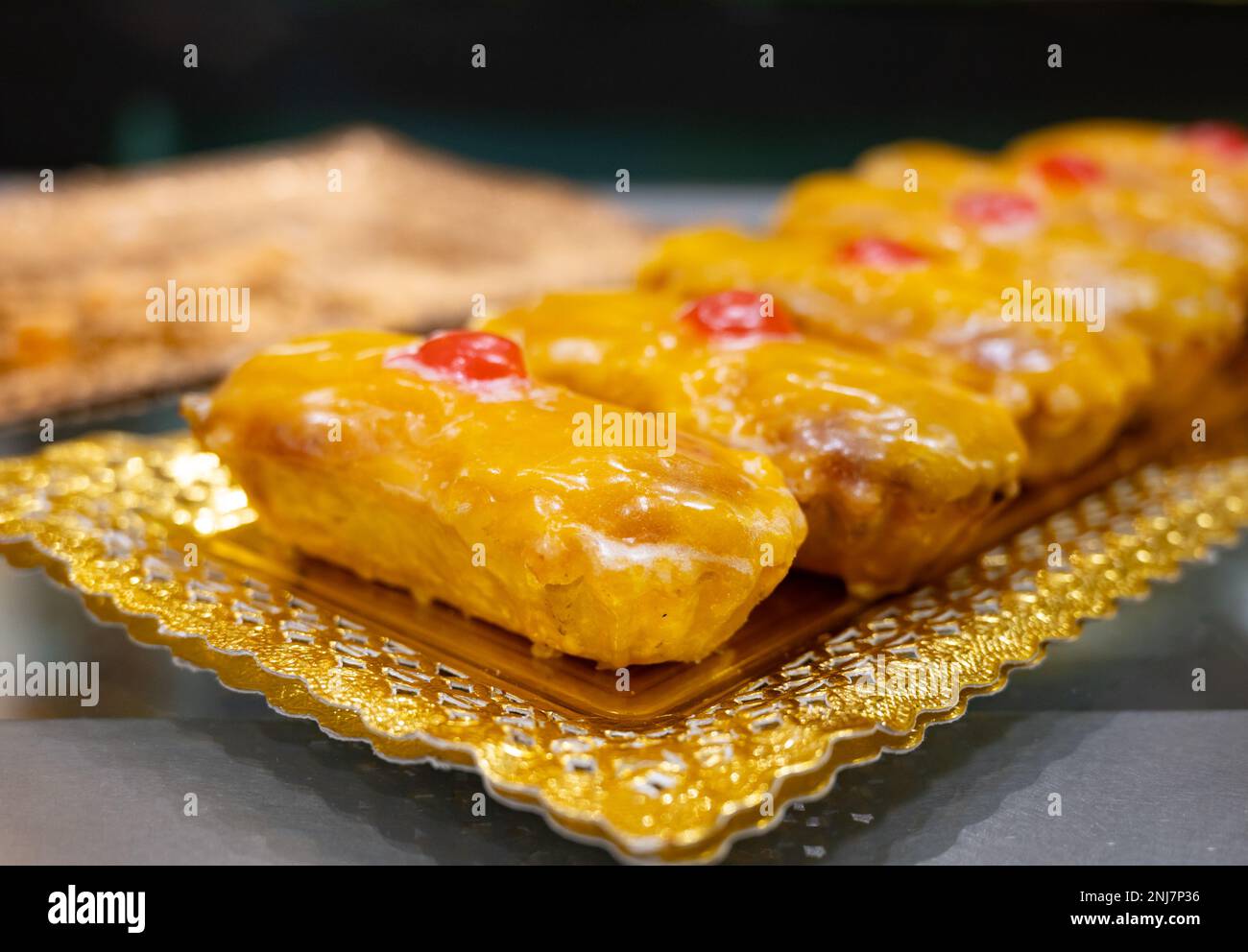 Delicious fresh baked colorful decorated cakes, tarts with cream and ...