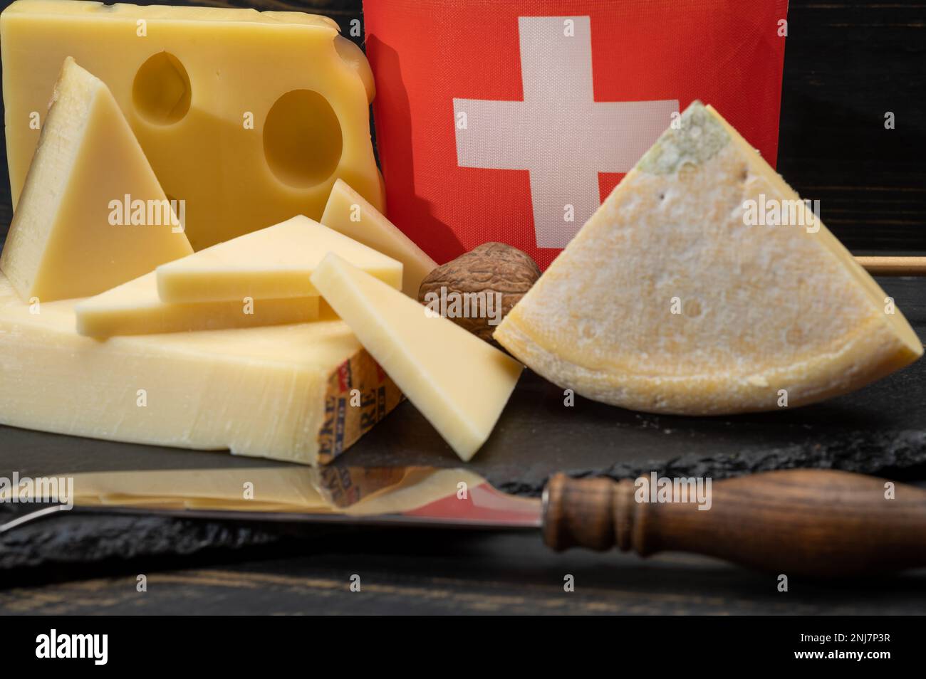 Assortment of Swiss cheeses Emmental or Emmentaler medium-hard cheese ...