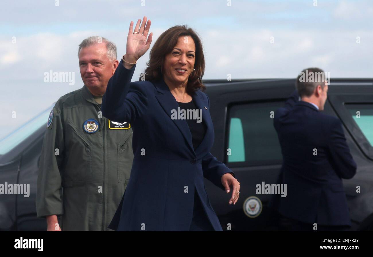 U.S. Vice President Kamala Harris waves next to Lt. Gen. Ricky N. Rupp ...