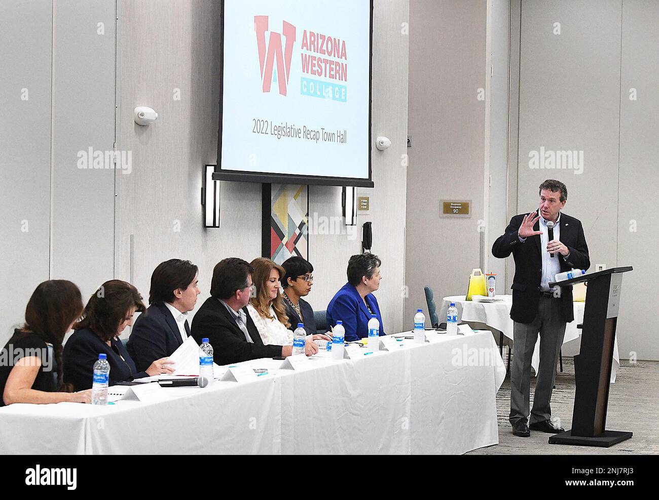 Arizona Western College President Dr. Daniel Corr, right, offers ...