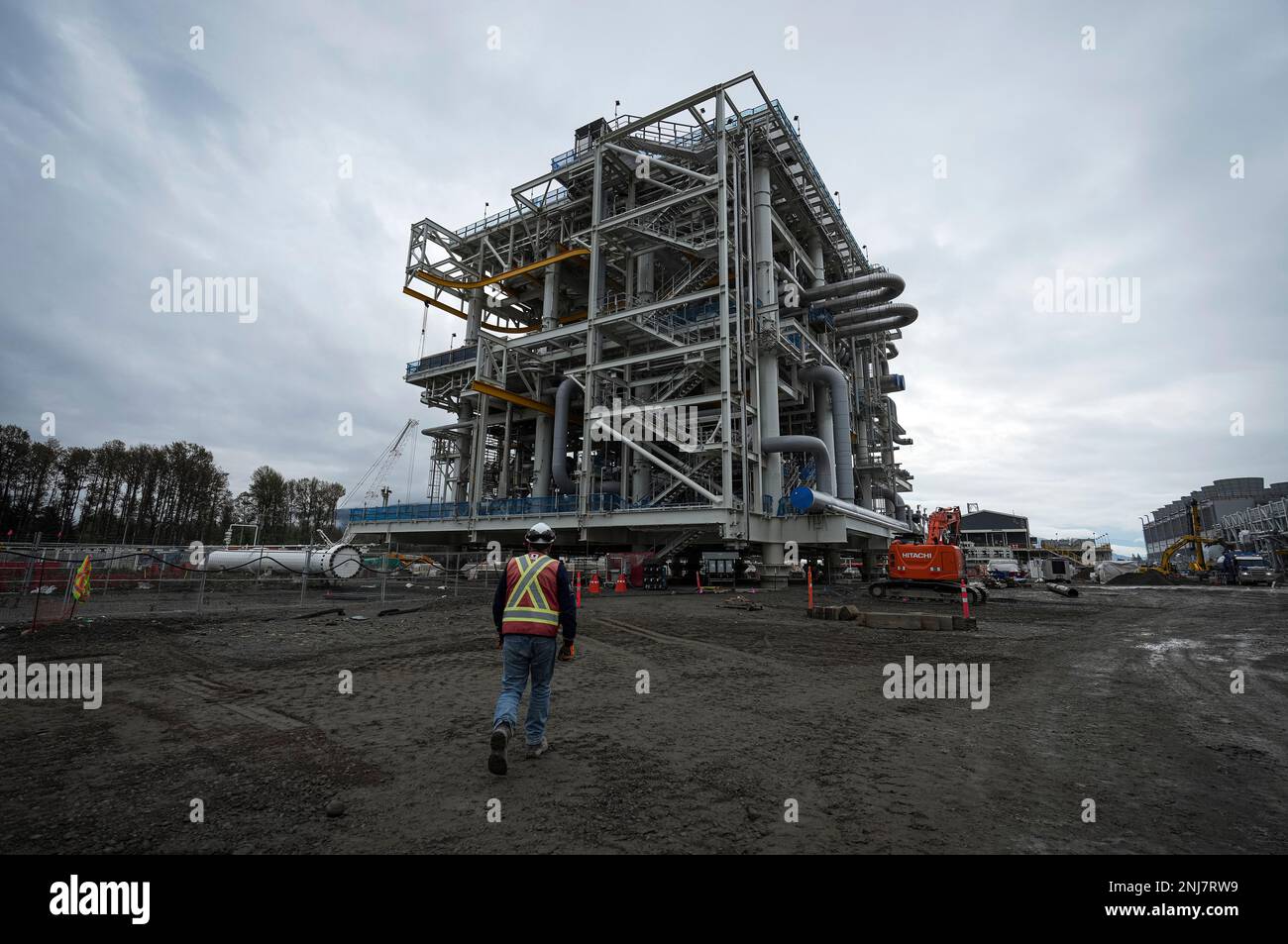 LNG Canada construction general manager Vince Kenny walks towards a ...