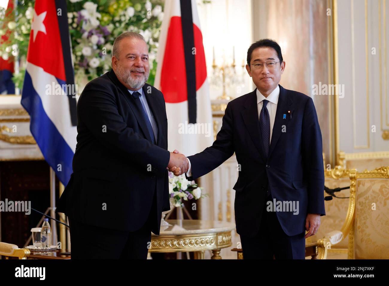 Japan's Prime Minister Fumio Kishida, right, greets Cuba's Prime ...