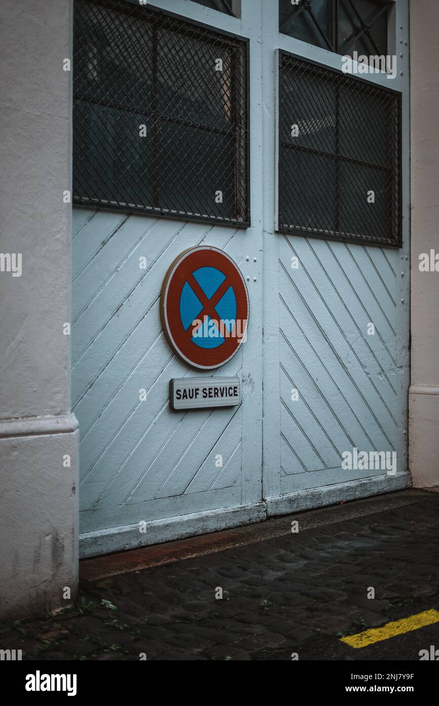 Sauf service sign, no parking sign in France Stock Photo - Alamy