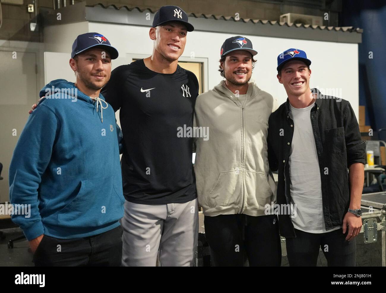 New York Yankees center fielder Aaron Judge, second from left, meets ...