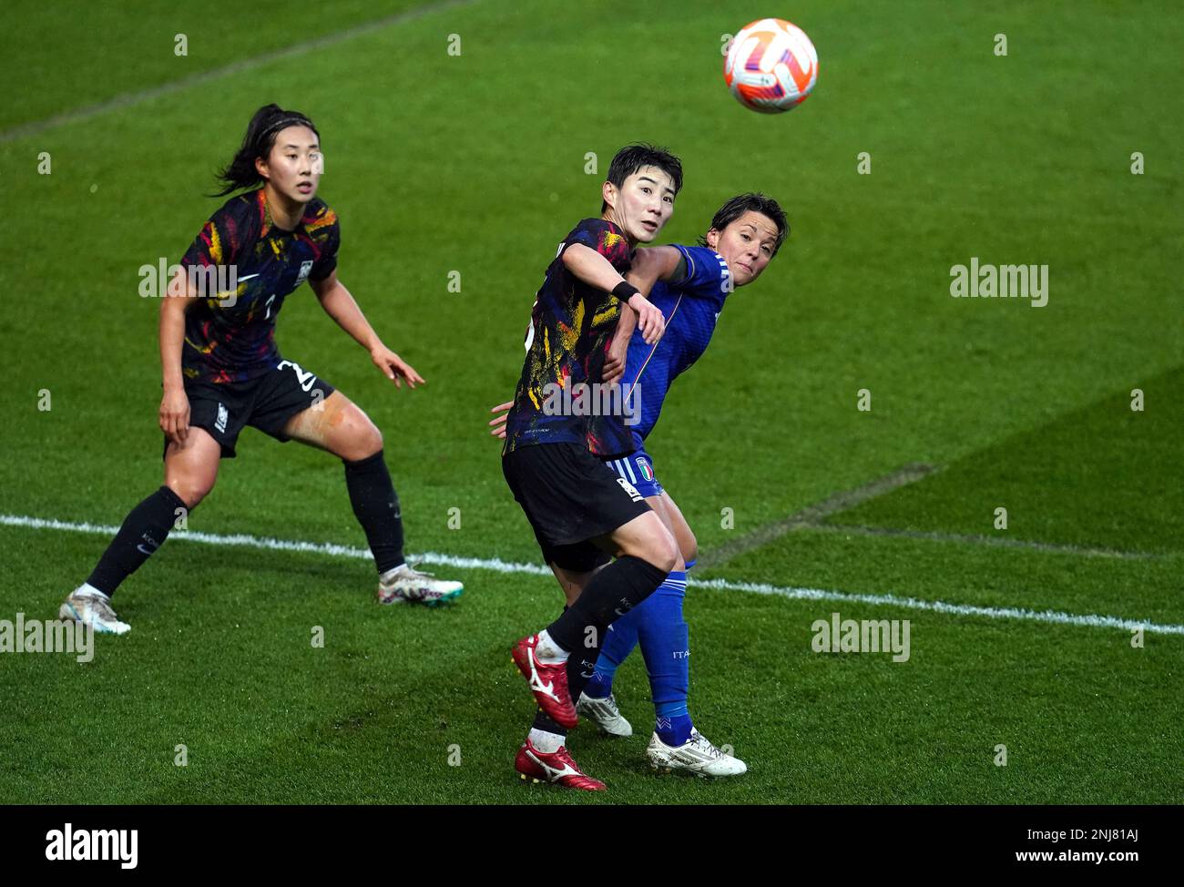 Italy's Valentina Giacinti (right) and South Korea's Kim Yun-Ji battle ...