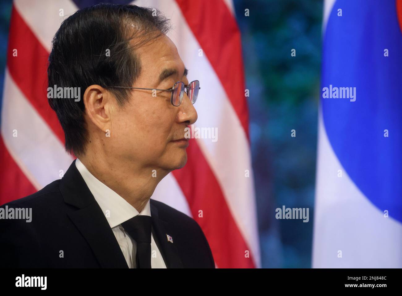 South Korea's Prime Minister Han Duck-soo listens during a bilateral ...