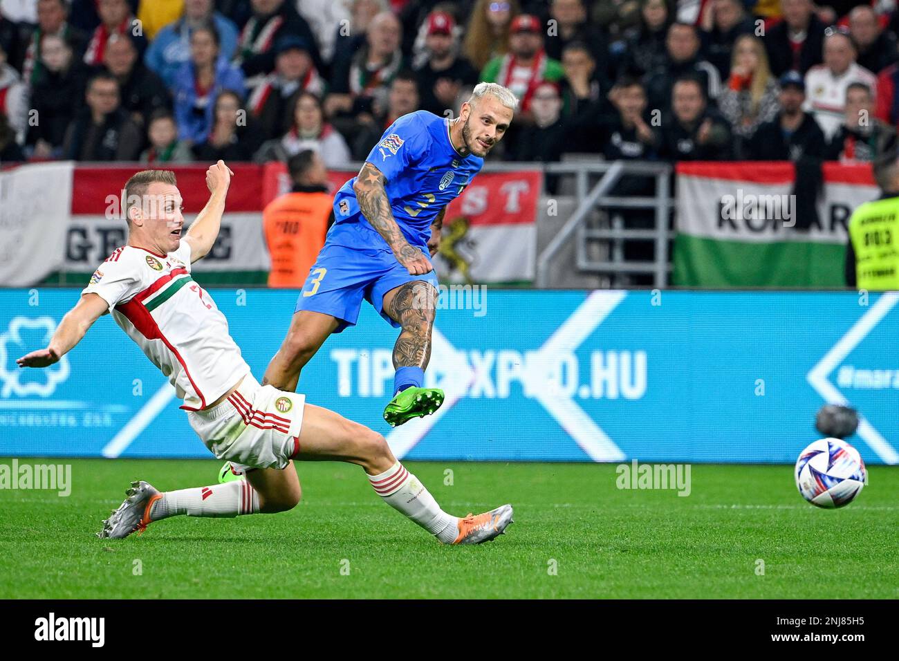 Italy's Federico Dimarco, right, in action against Hungary's Adam Lang ...
