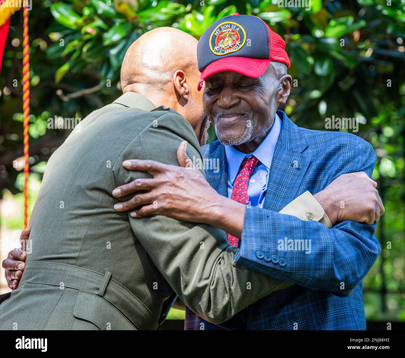 U.S. Marine Corps Gen. Michael E. Langley is congratulated by his ...