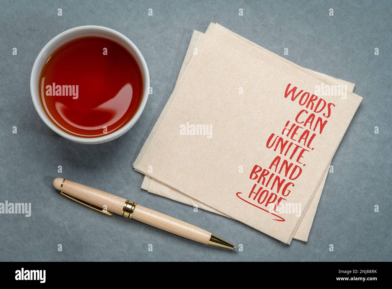 Words can heal, unite, and bring hope. Inspirational handwriting on a ...