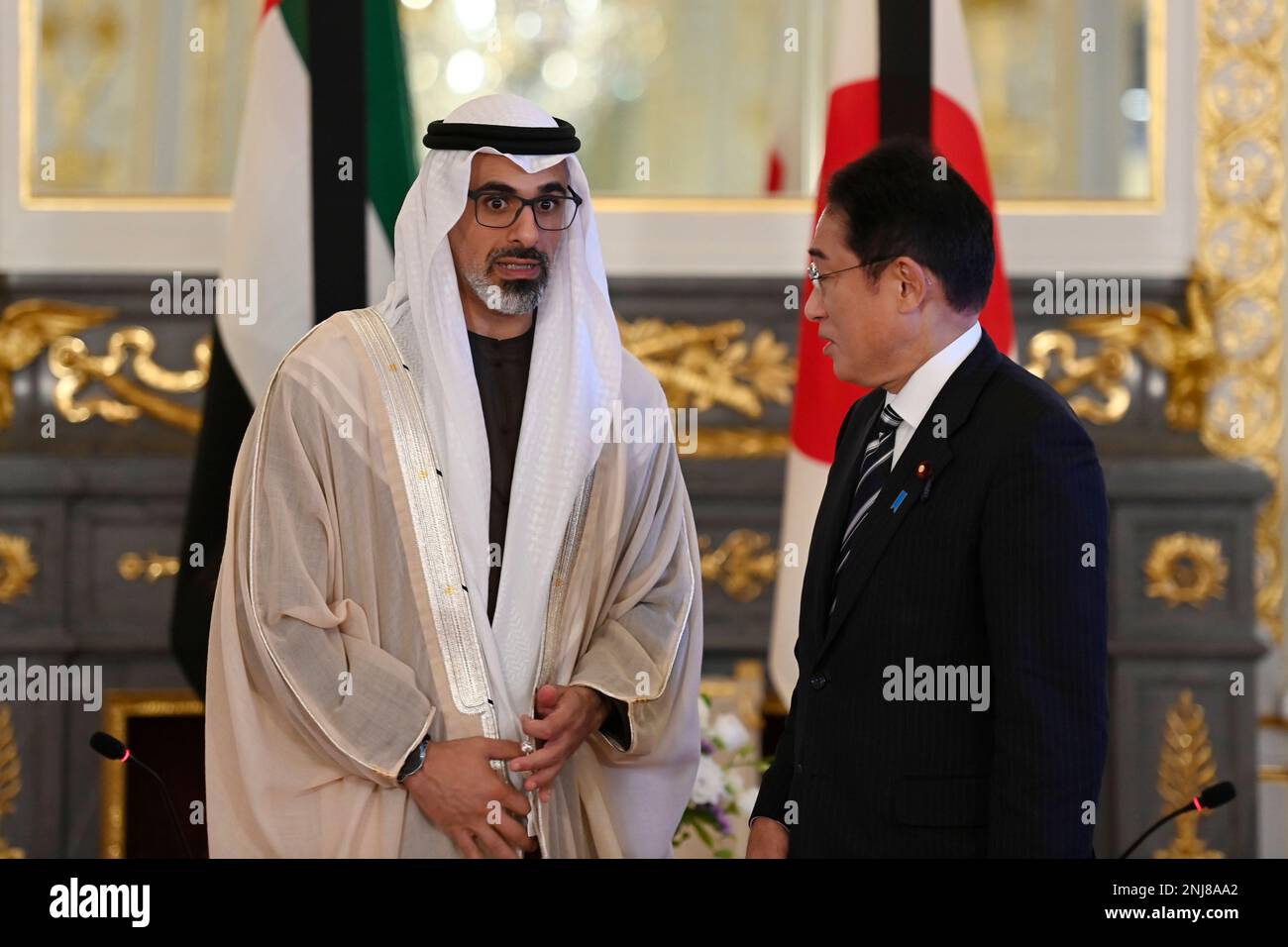 Japan's Prime Minister Fumio Kishida, right, and Sheikh Khaled bin ...