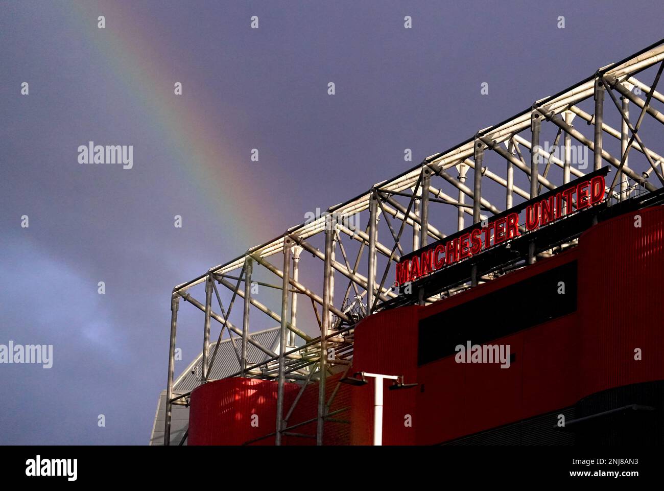 A rainbow is seen behind the stadium before a press conference at Old ...