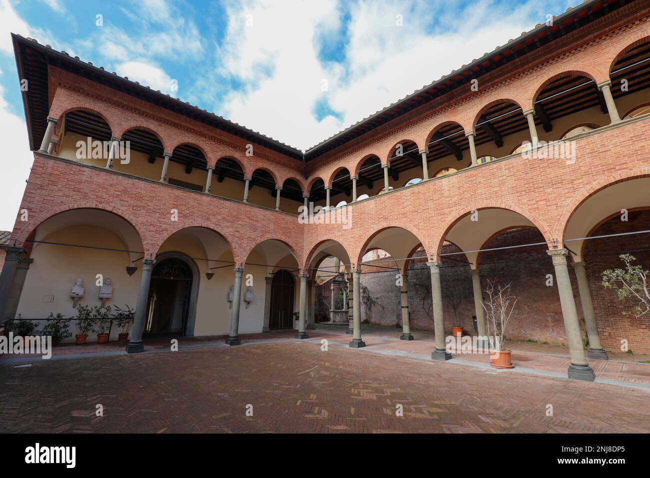 Siena, SI, Italy - February 20, 2023: Ancient cloister of the convent ...