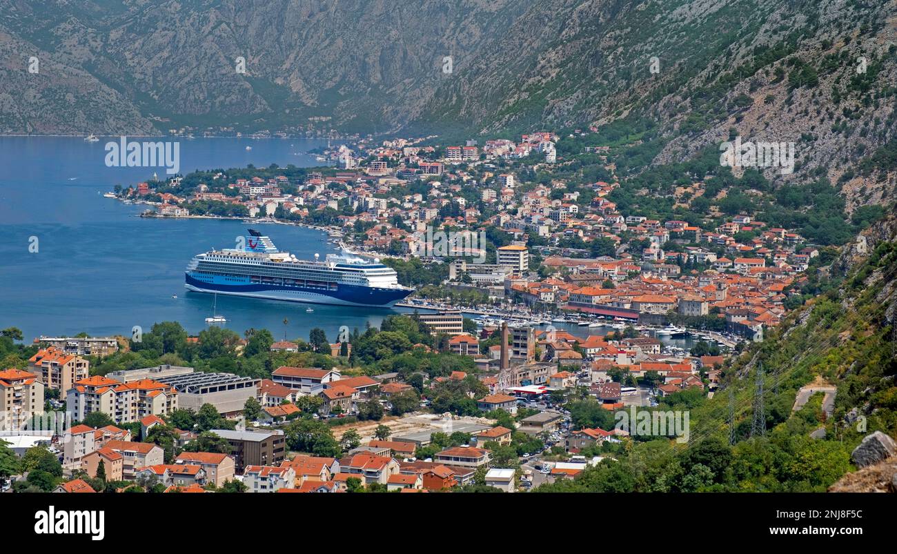 View over the city Kotor and cruise ship moored in the Mediterranean ...