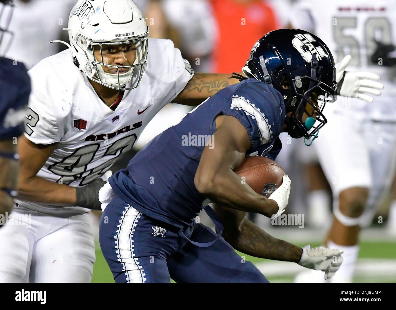 Utah State wide receiver NyNy Davis (6) runs with the ball as UNLV ...