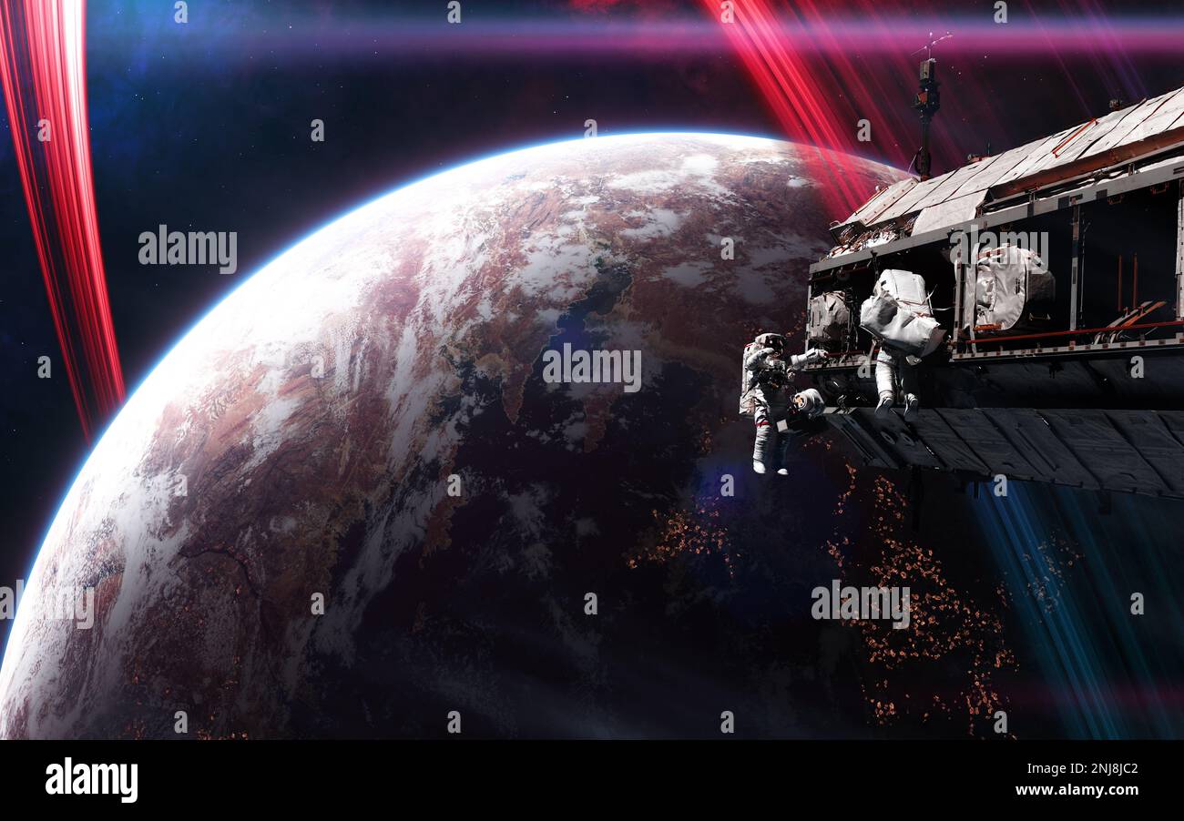 Space station in front of inhabited deep space planet Stock Photo - Alamy