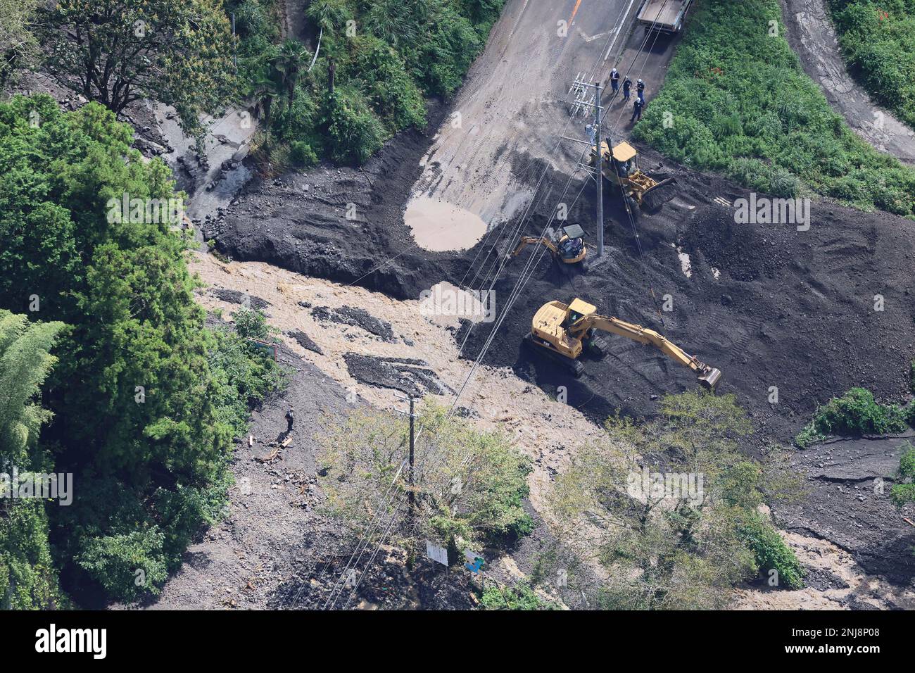 An aerial photo shows a landslide site triggered by heavy rain of ...