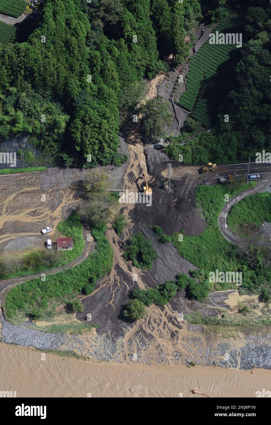 An aerial photo shows a landslide site triggered by heavy rain of ...