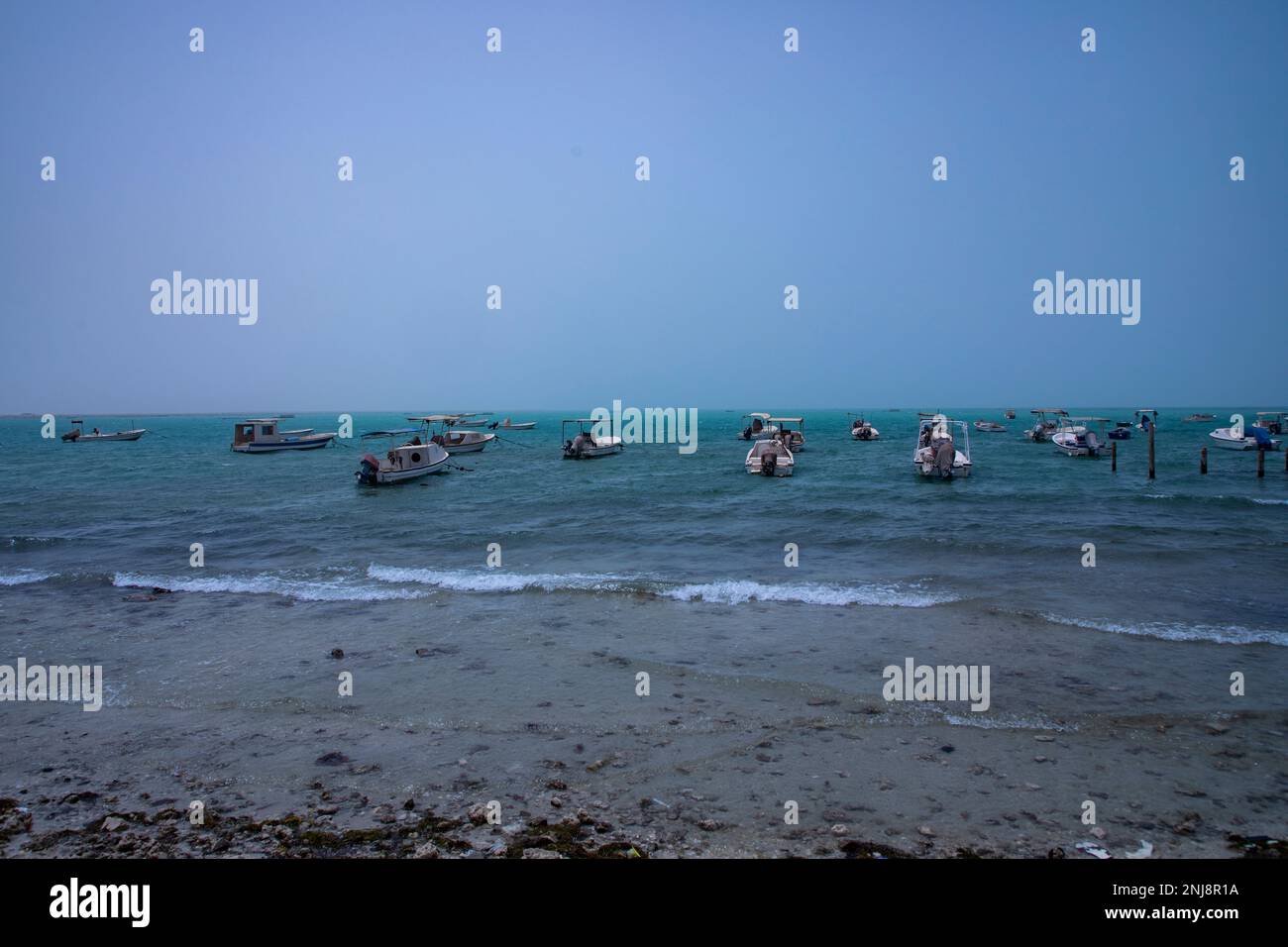 Boats anchored in Persian gulf at Manama in the Kingdom of Bahrain ...