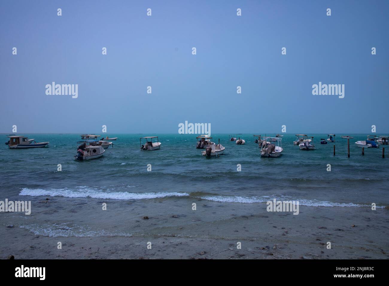 Boats anchored in Persian gulf at Manama in the Kingdom of Bahrain ...
