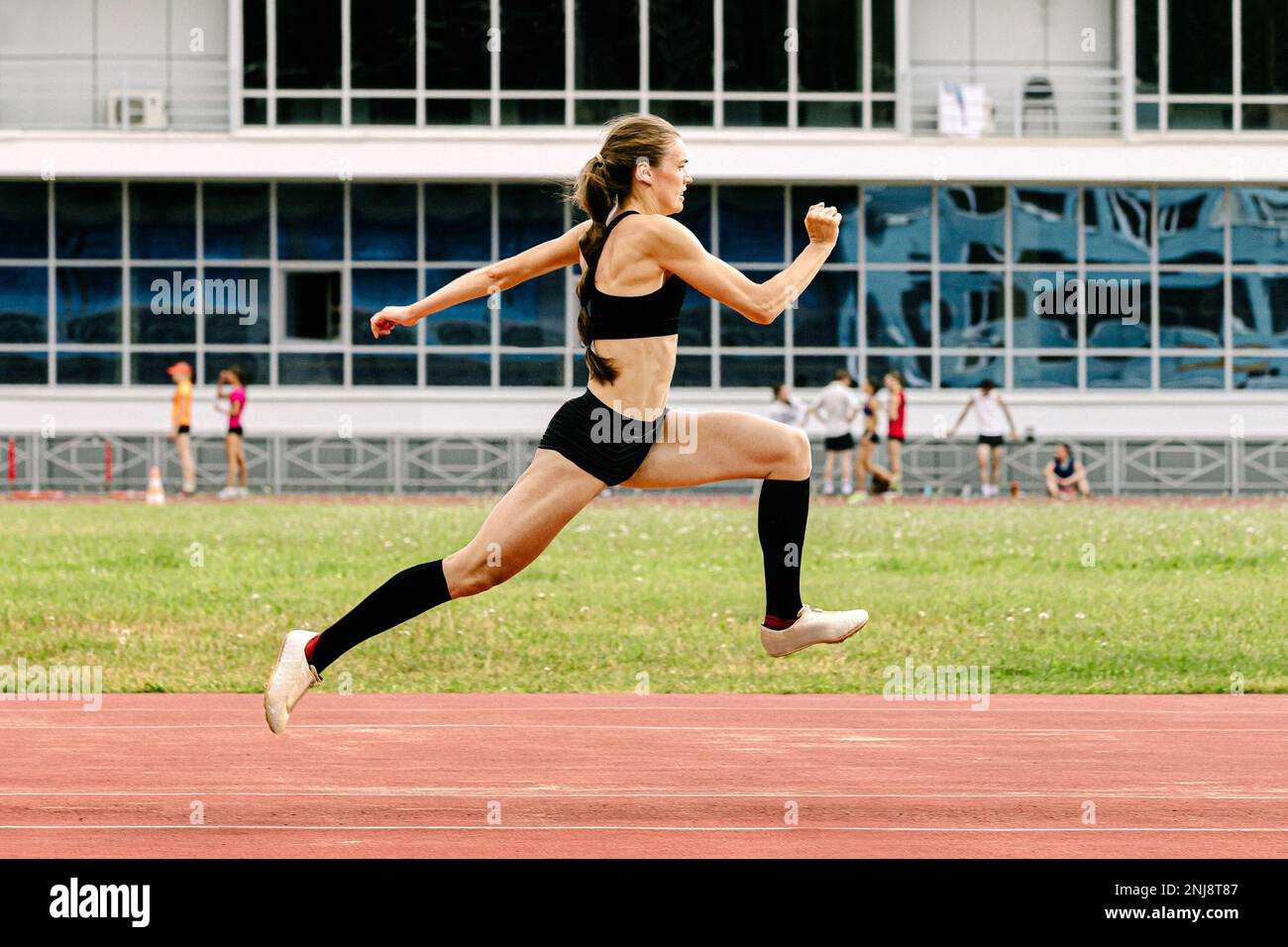 Female triple jump hi-res stock photography and images - Alamy