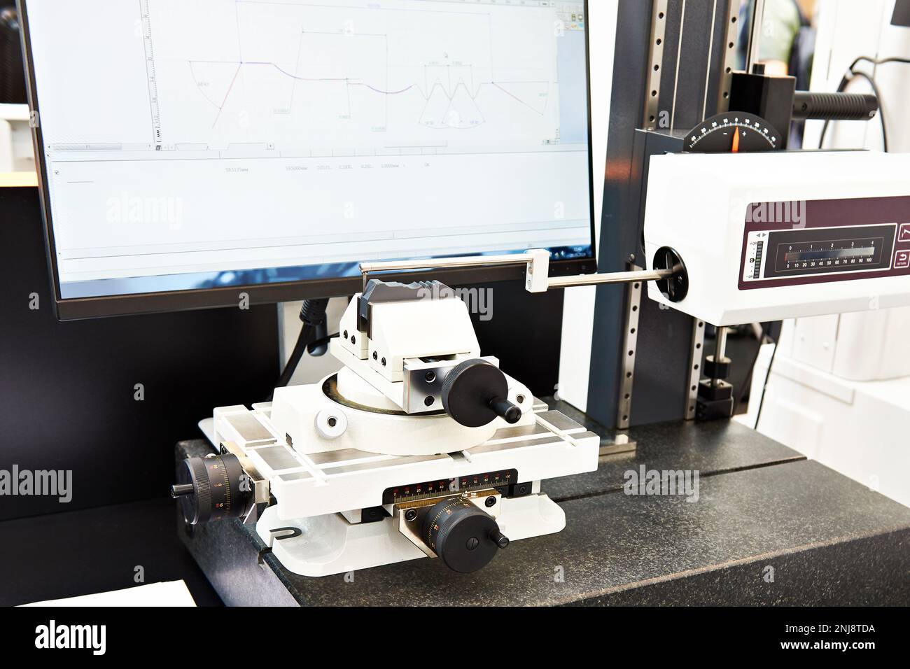 Contracer contour measuring systems with monitor Stock Photo - Alamy