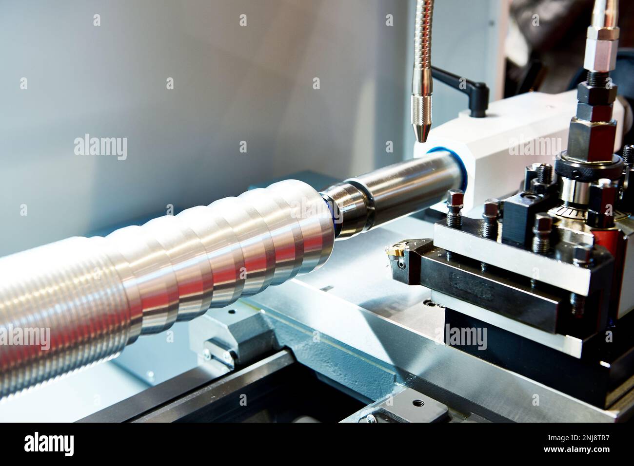 Steel product in the lathe Stock Photo - Alamy