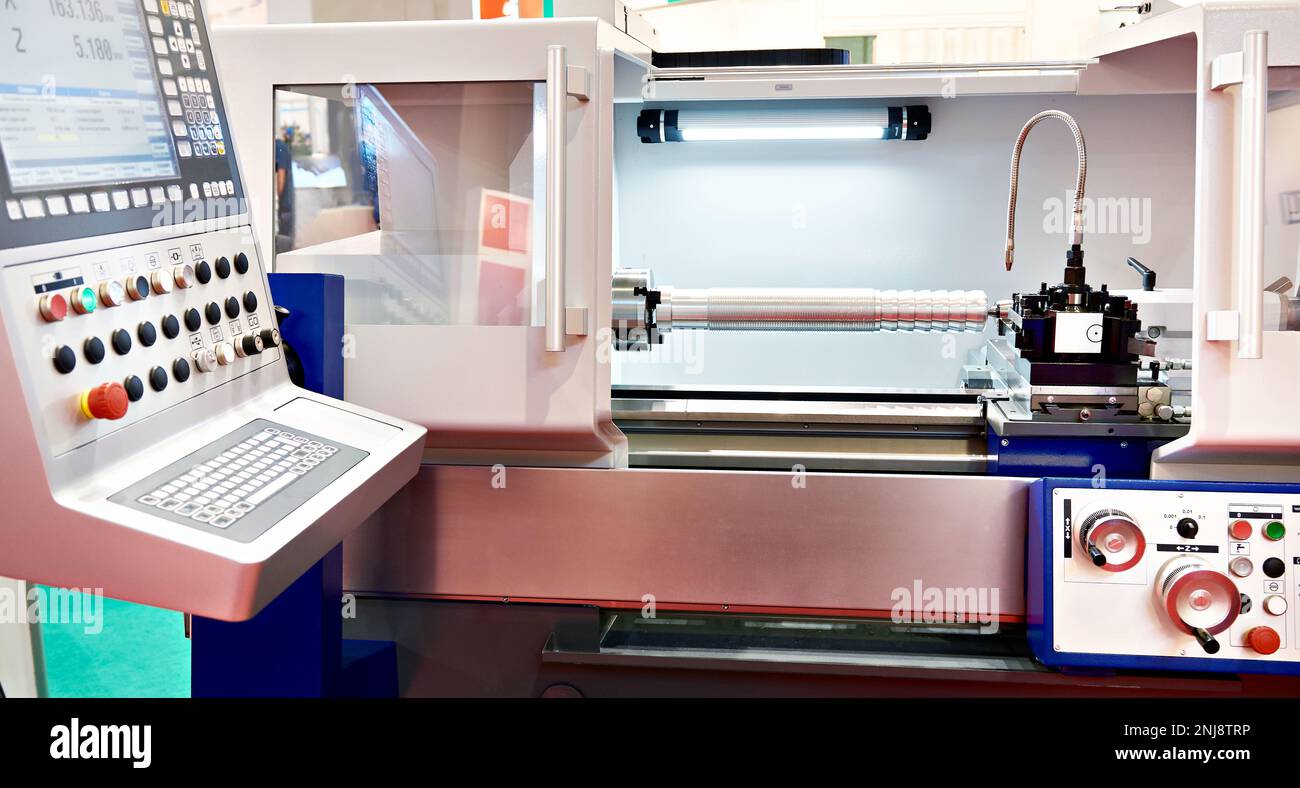 Steel product in the CNC lathe Stock Photo - Alamy