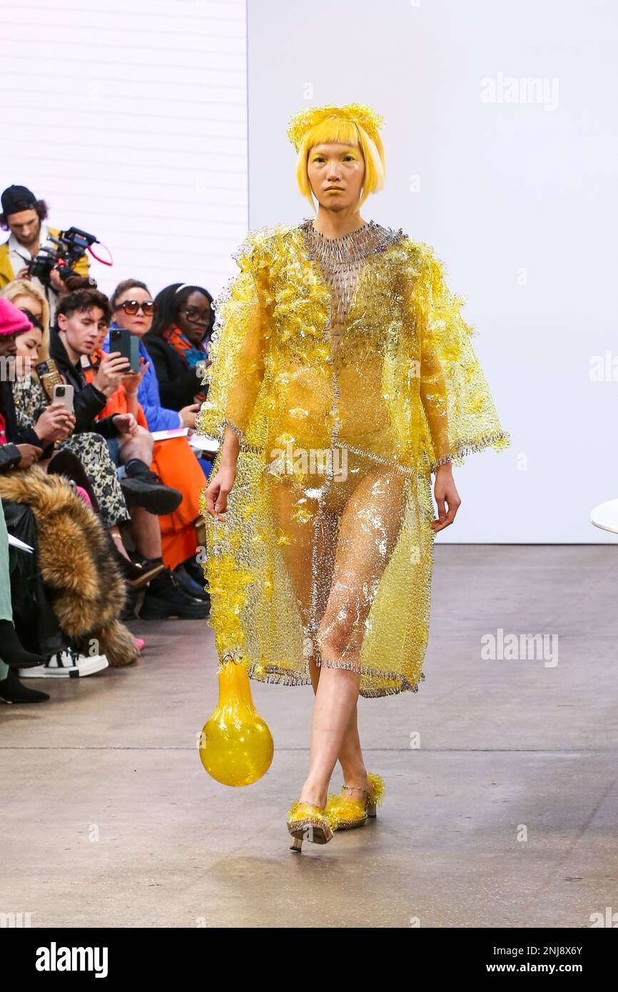 London, UK. 19th Feb, 2023. A model walks the runway wearing an outfit ...