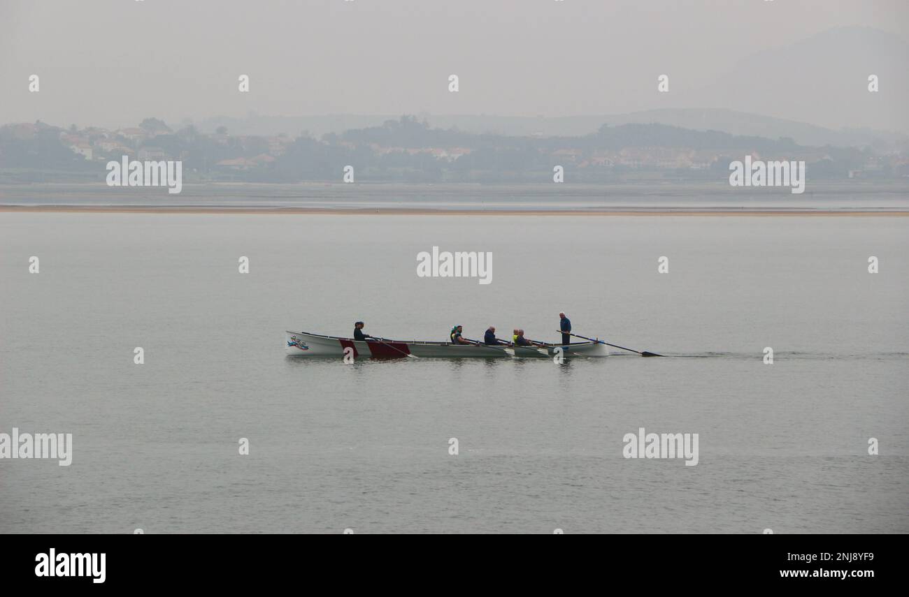 A traditional Cantabrian trainera racing rowing boat training in the ...