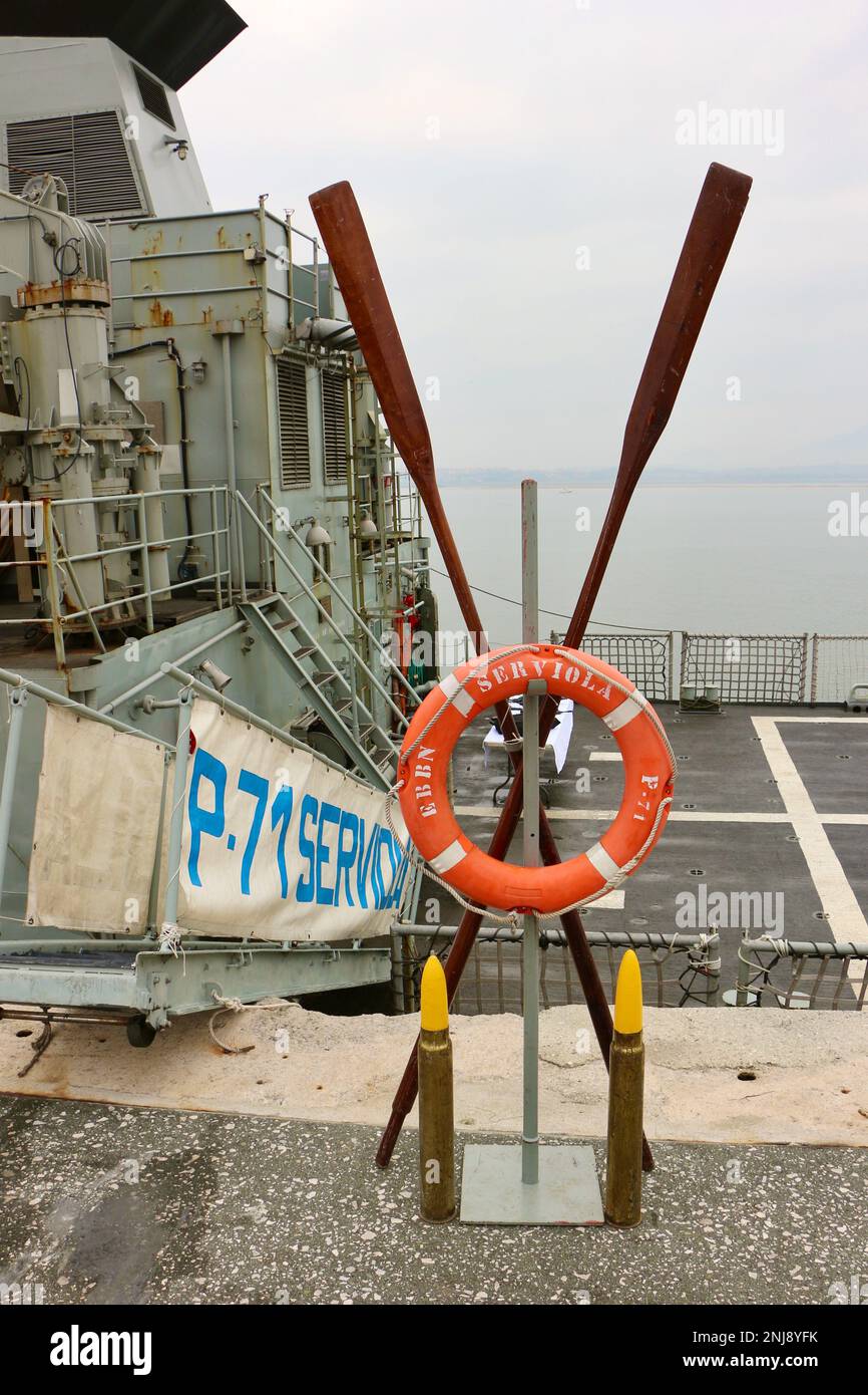 Dummy shells lifebelt and oars at the gangplank Spanish patrol boat ...