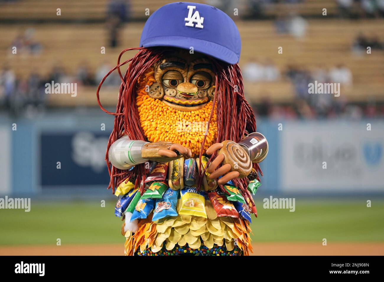 ampm mini market convenience store mascot Toomgis reacts after throwing ...