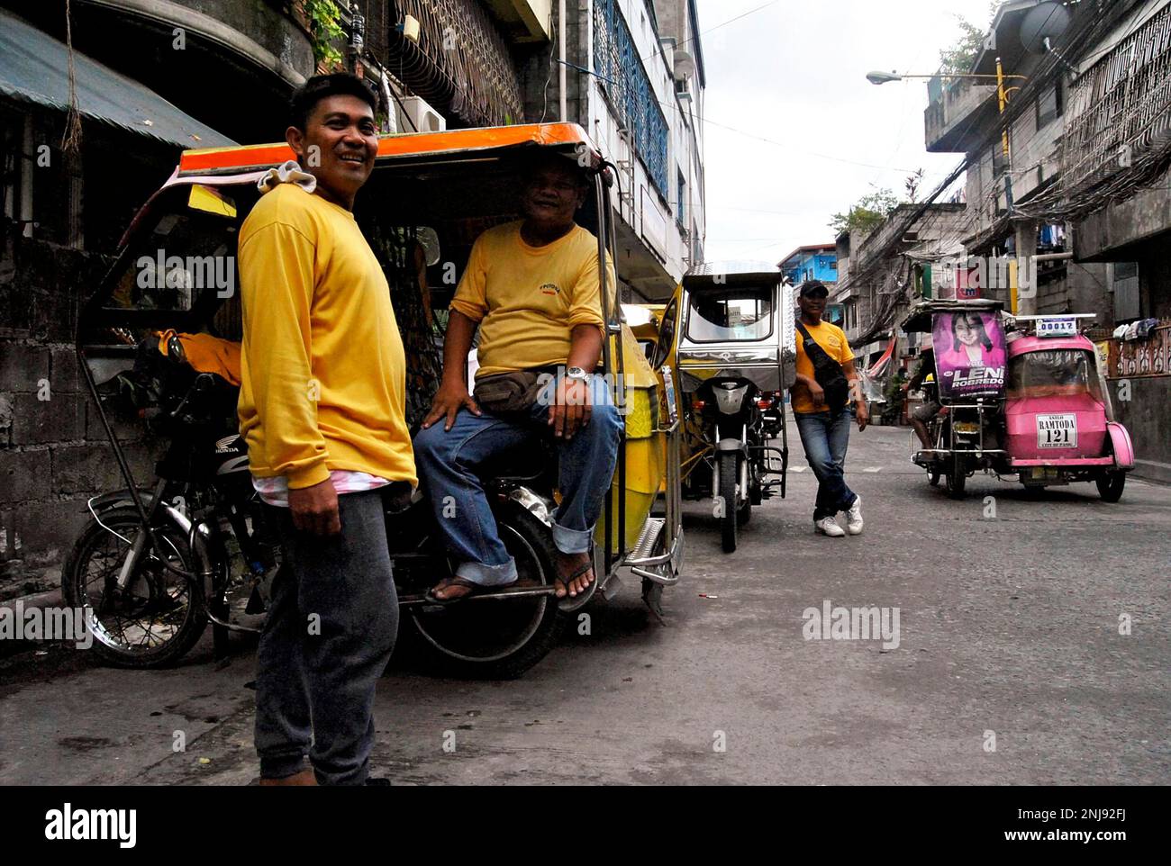 Drivers of tricycles, auto rickshaw, are pictured in Manila ...