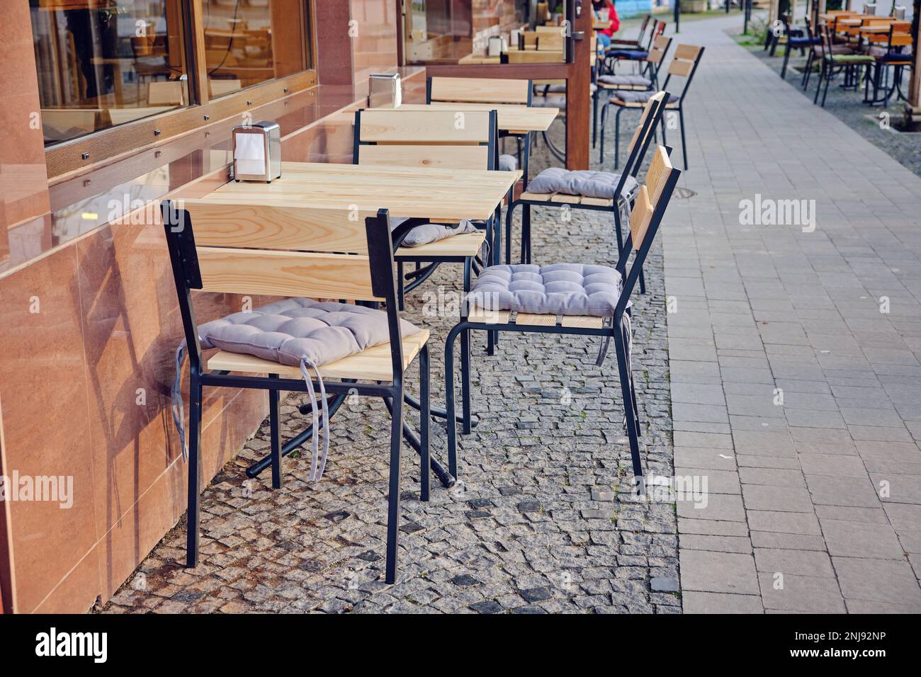 Outdoor street cafe tables ready for service. Small GRIP Stock Photo ...
